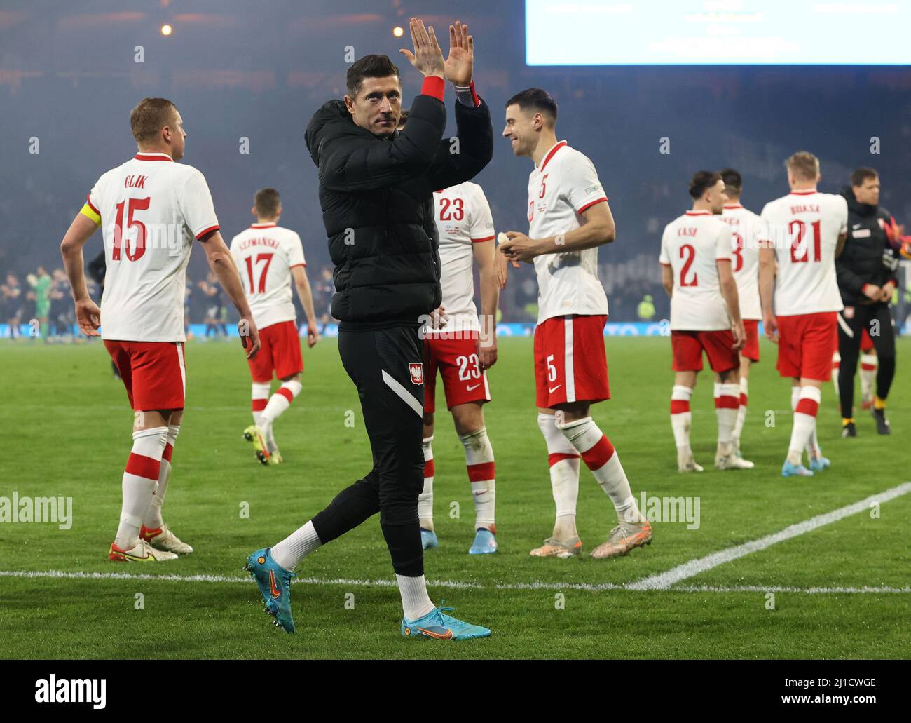 Poland's Robert Lewandowski (centre left) applauds the fans following ...