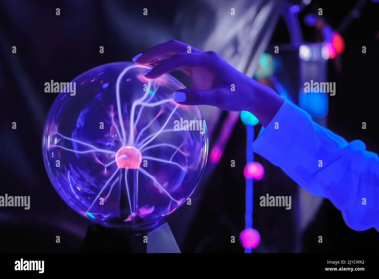 Plasma ball woman hi-res stock photography and images - Alamy