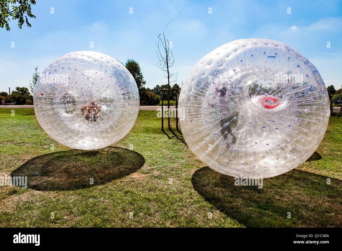 Children zorbing hi-res stock photography and images - Alamy