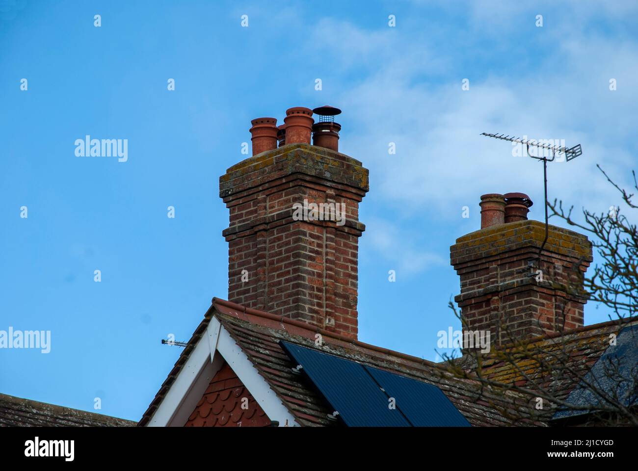 Old traditional English house roof with solar panels Stock Photo - Alamy