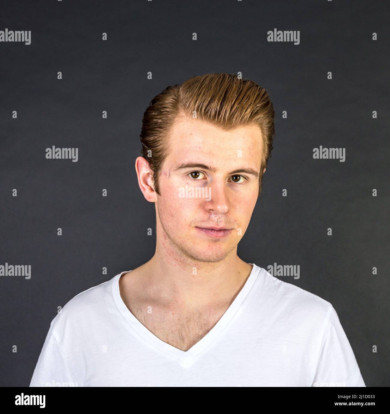 portrait of cool looking teenage boy in studio Stock Photo - Alamy