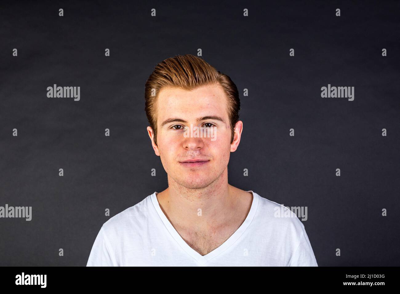 portrait of cool looking teenage boy in studio Stock Photo - Alamy