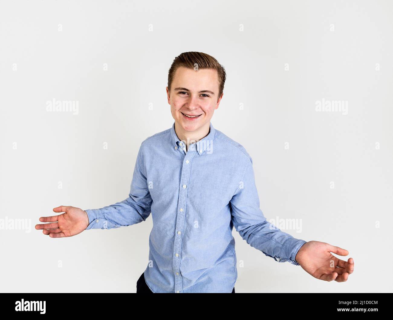 cute smiling teenage boy looks happy and confident Stock Photo - Alamy