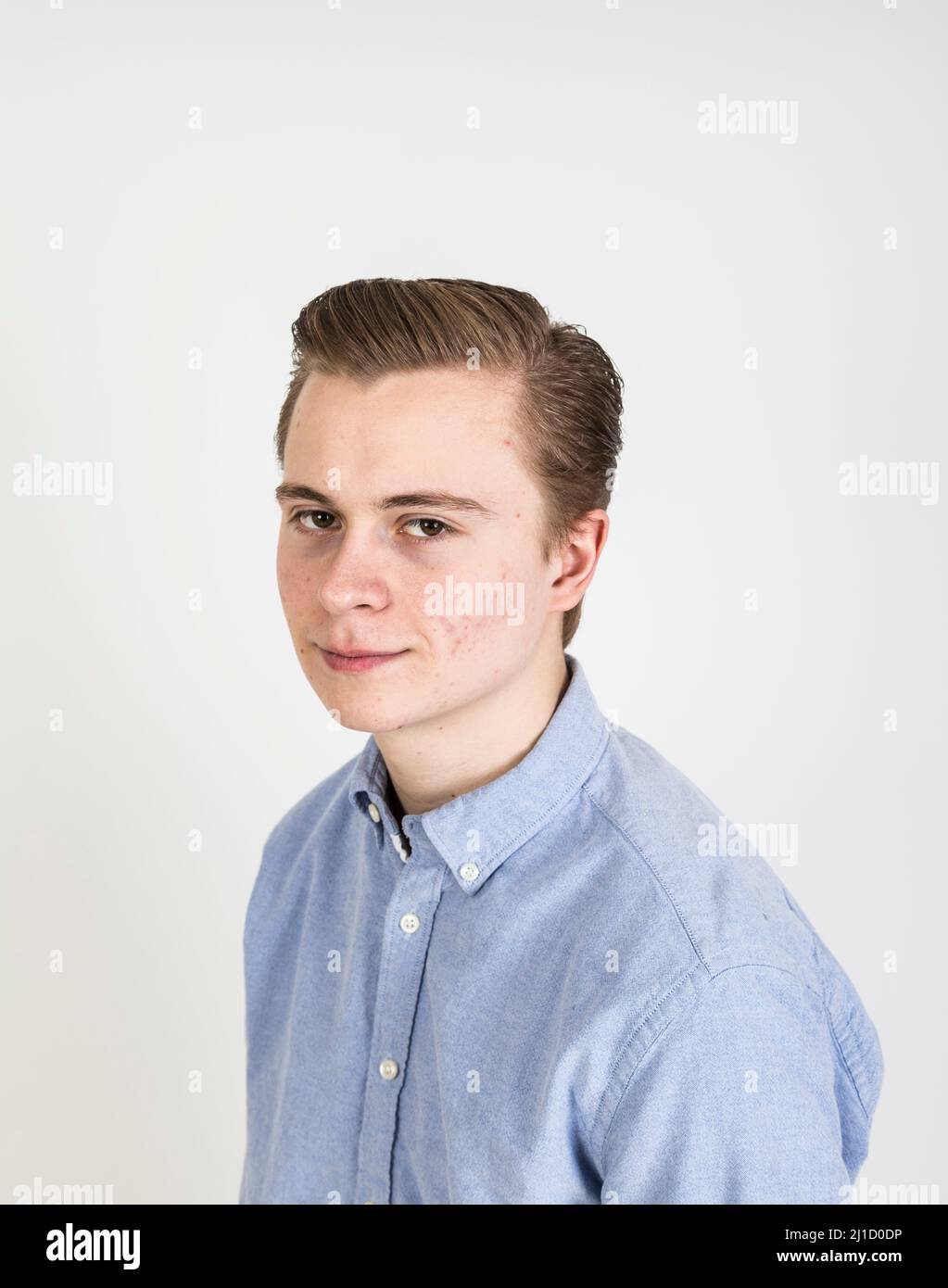 cool looking teenage boy is happy and confident Stock Photo - Alamy