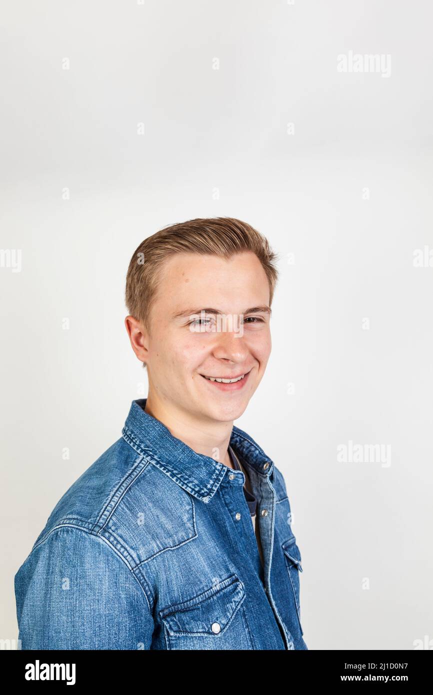 portrait of cute smiling boy posing in studio Stock Photo - Alamy