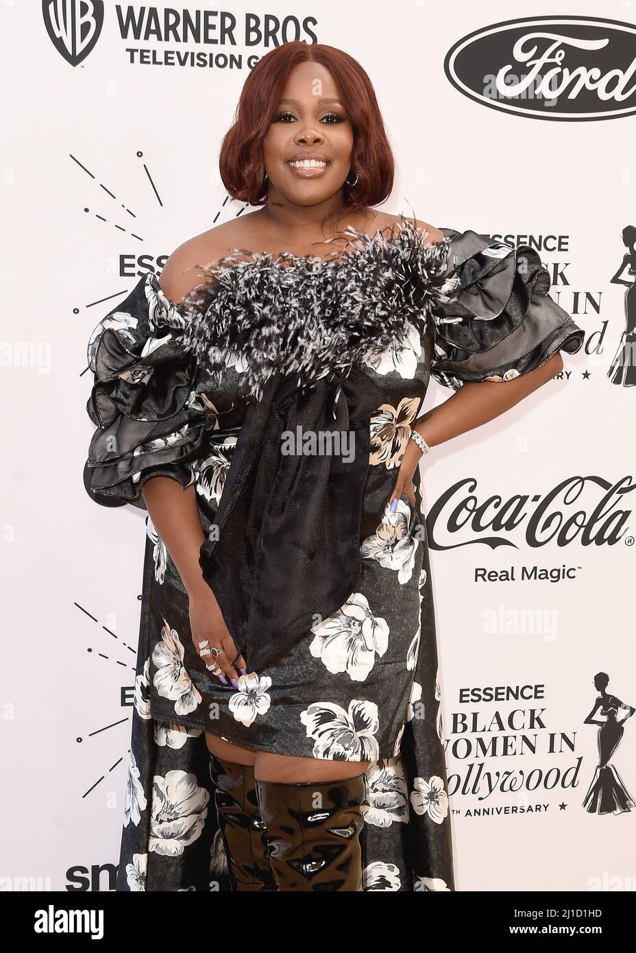 Amber Riley walking on the red carpet at Essence 15th Annual Black ...