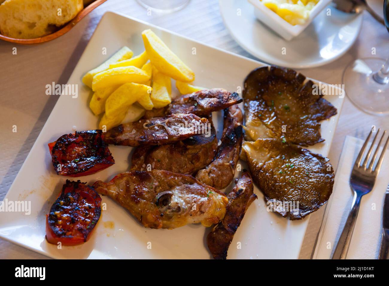 Plate of tasty roasted mutton Stock Photo - Alamy
