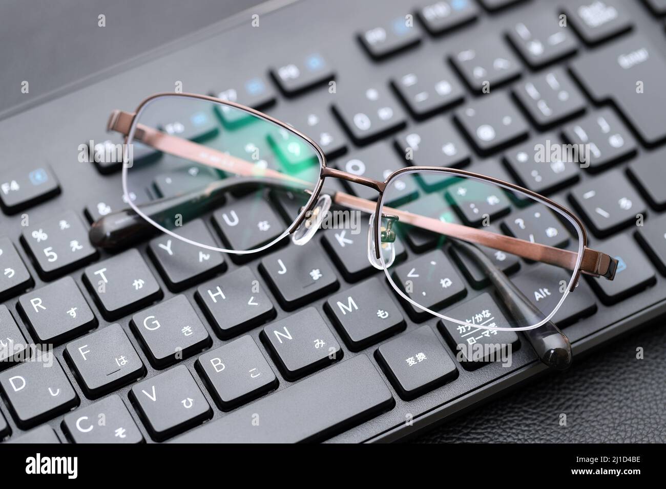 Stylish eyesight glasses with computer keyboard. Alphabetics and ...