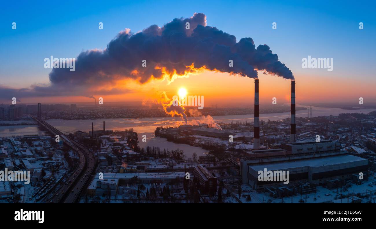Plant pipe high above the clouds. Harmful emissions into the upper ...