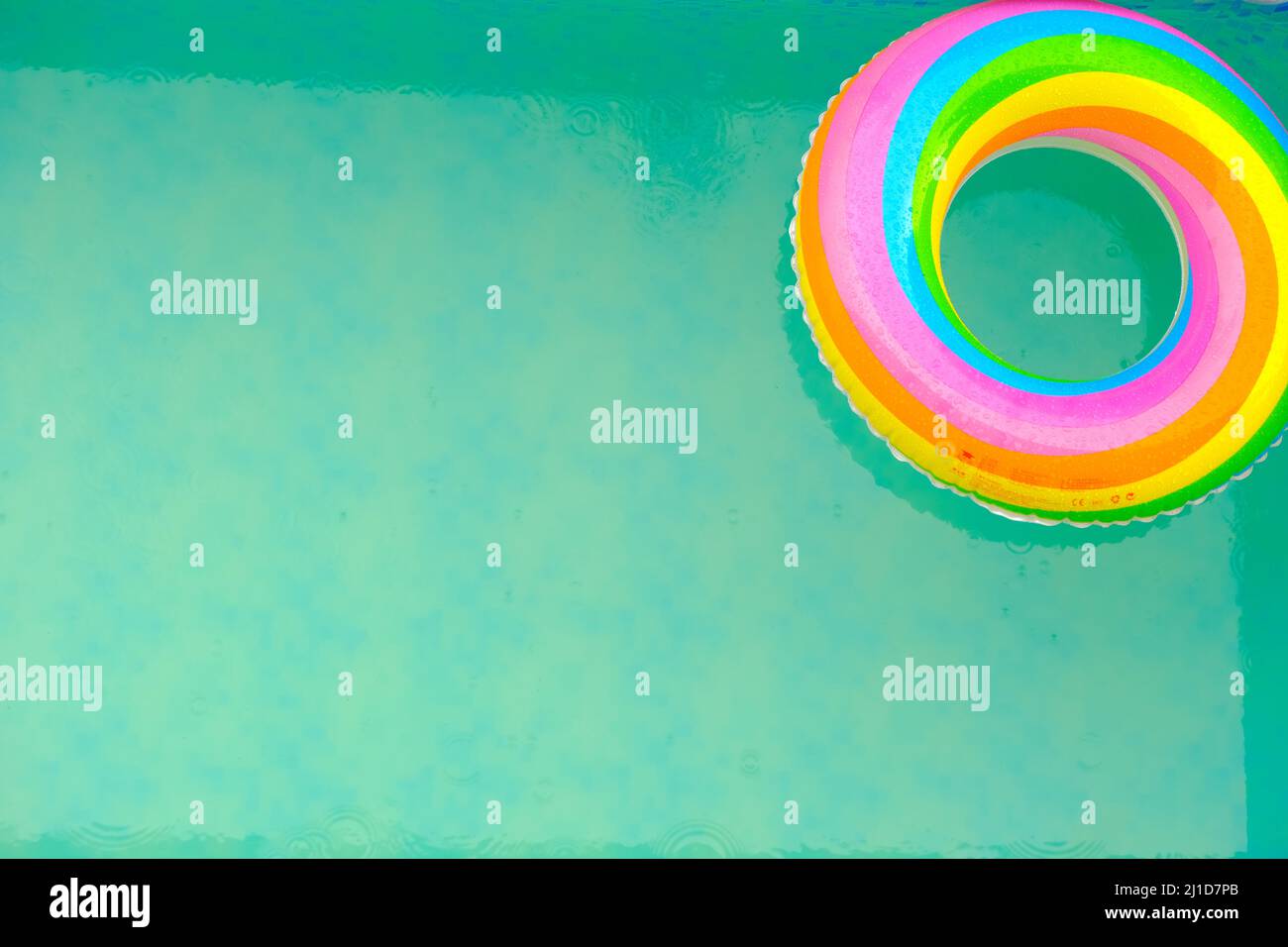 Rainbow swim ring hi-res stock photography and images - Alamy