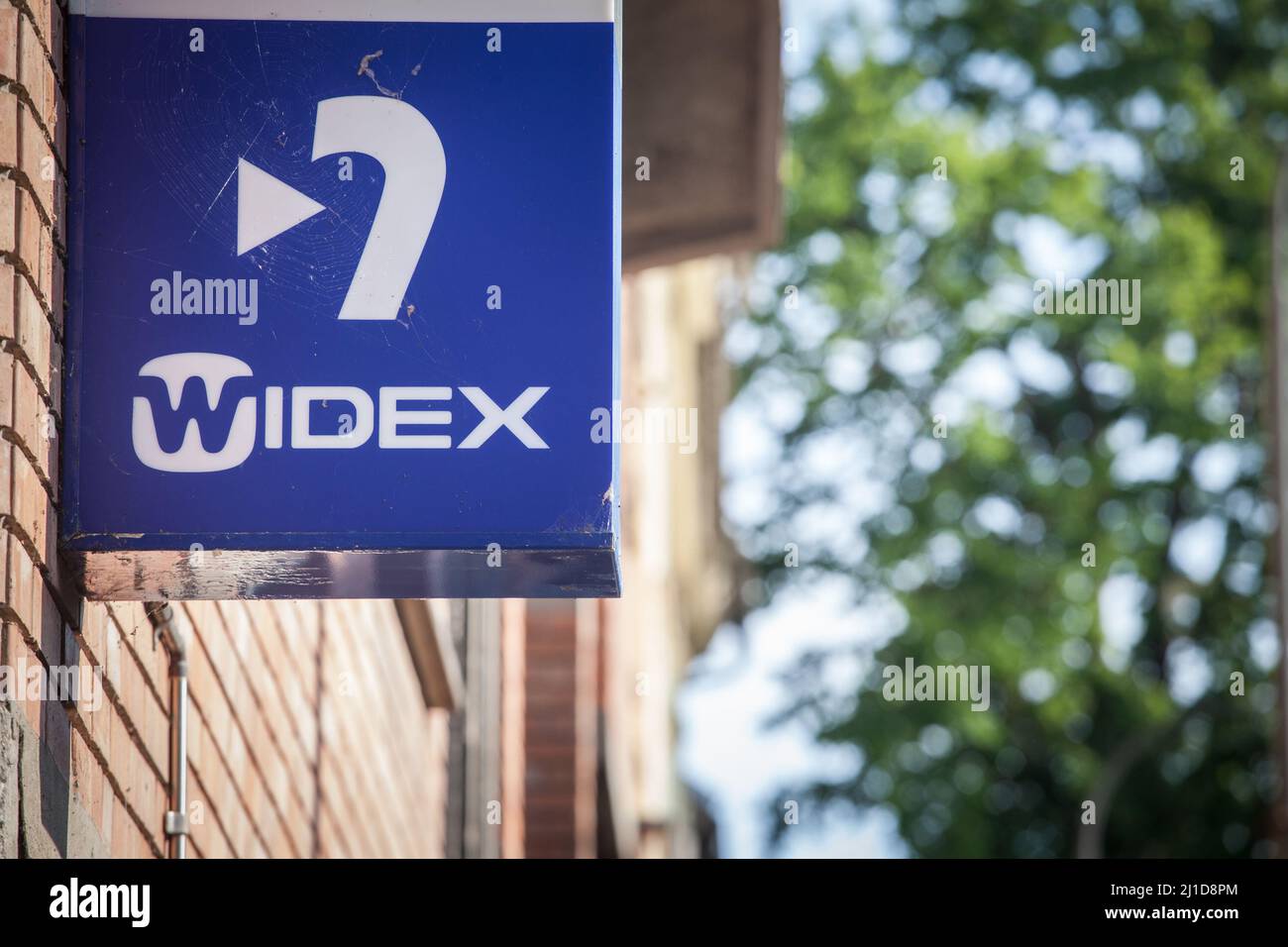 Picture of a sign with the logo of Widex on their local store in ...
