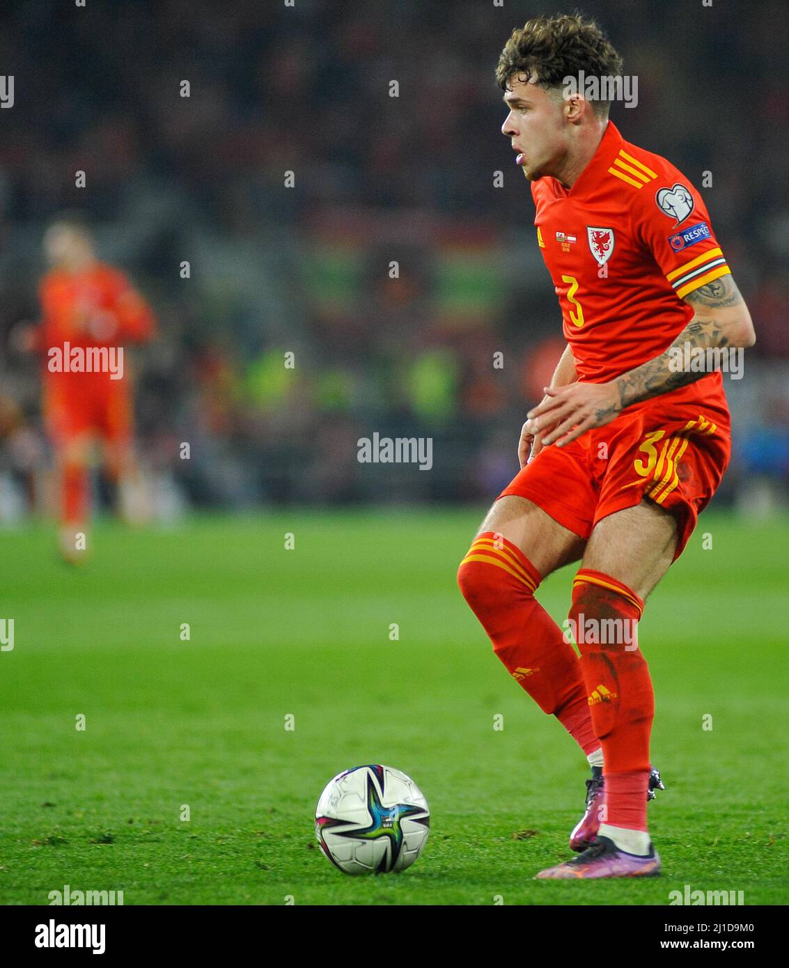 Cardiff, UK. 24th Mar, 2022. Neco Williams (Wales no 3 ) on the ball ...