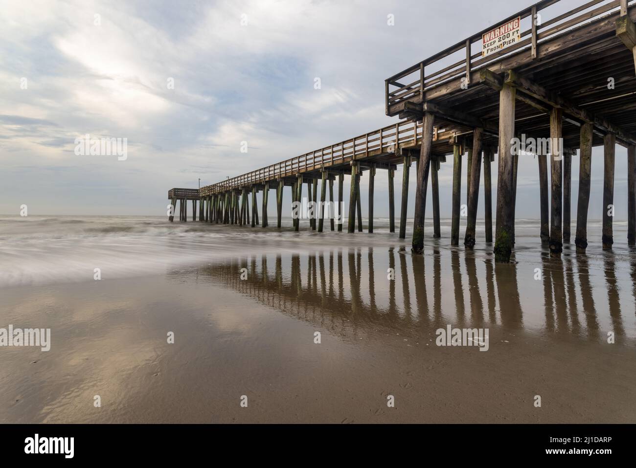 A scenic shot of a wooden pier at the beach Stock Photo - Alamy