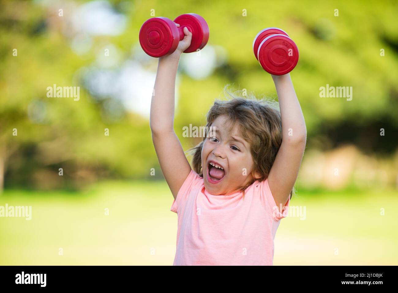 Happy kids sports exercises hi-res stock photography and images - Alamy