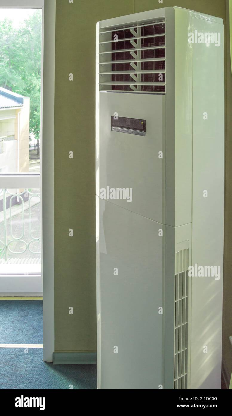 Vertical split system column air conditioner close-up for office ... Vertical split system column air conditioner close-up for office ...