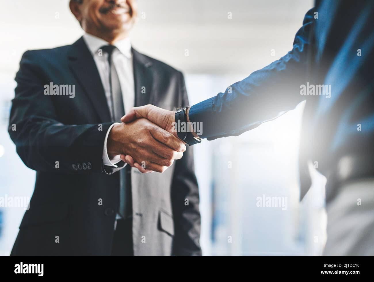 Lets build a better business together. Shot of two unrecognisable ...