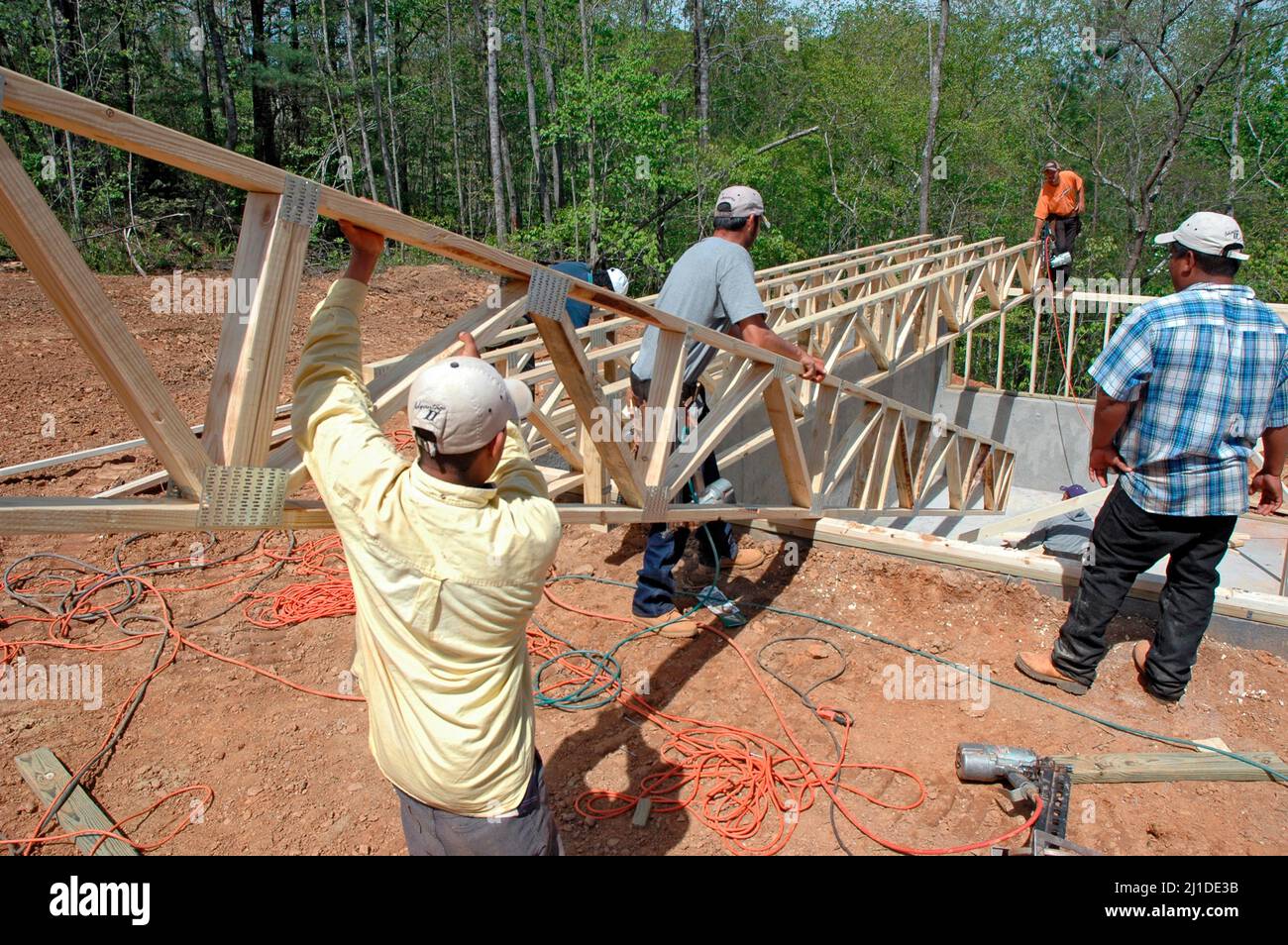 Rough wood framing crew from Mexico and Guatemala working in Atlanta ...