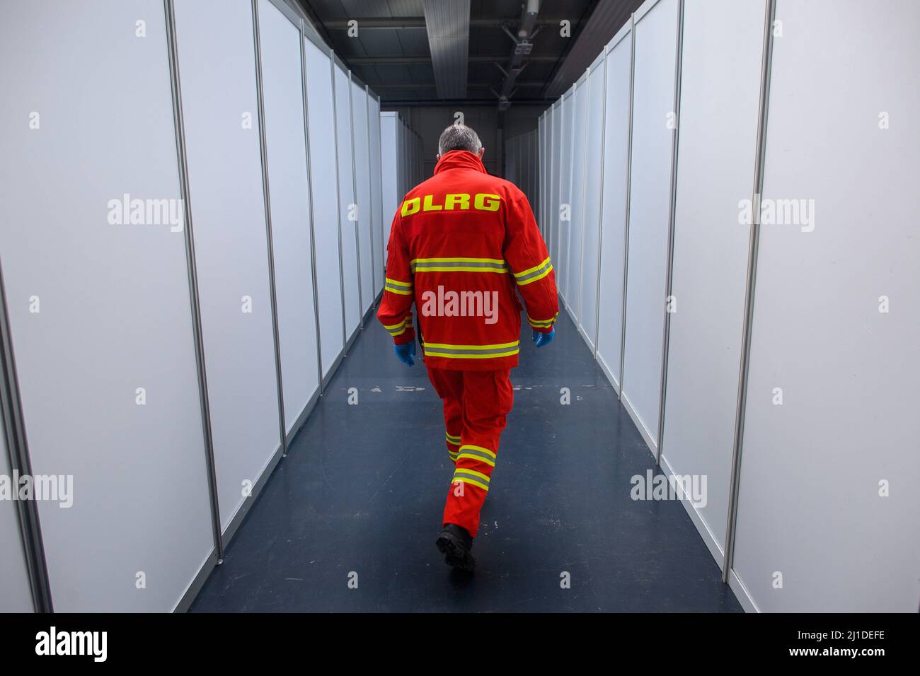 Magdeburg, Germany. 21st Mar, 2022. An employee of the German ...
