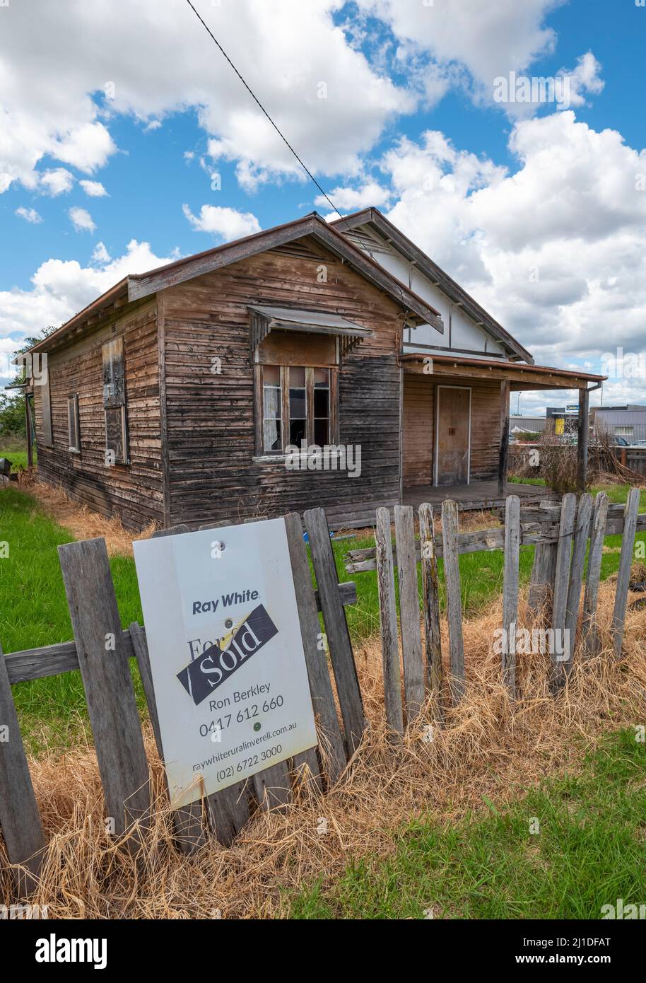 Dilapidated house in Inverell with sold sign out the front, shows that ...