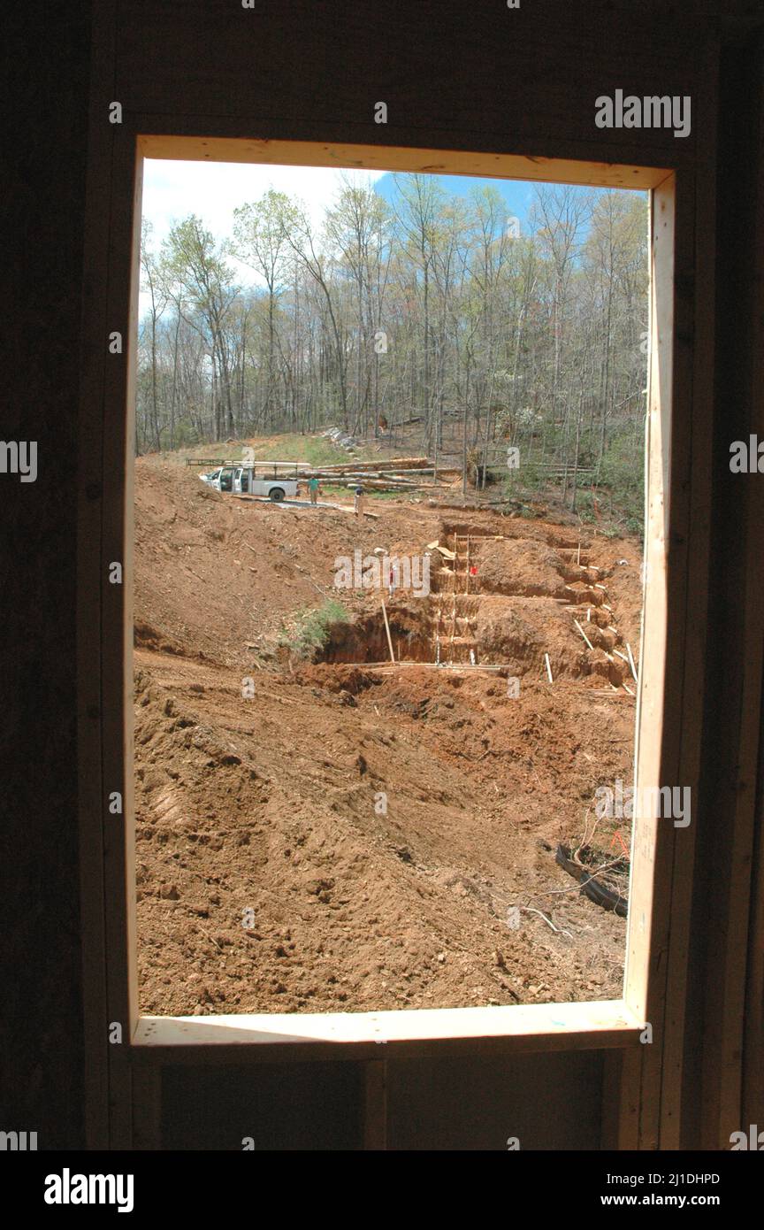 Clearing an leveling lots of trees for new house construction, with ...