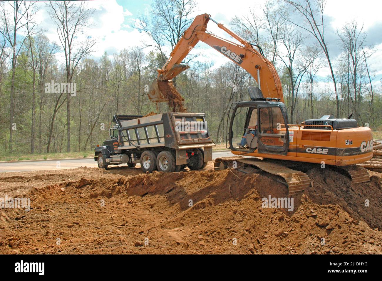 Clearing an leveling lots of trees for new house construction, with ...