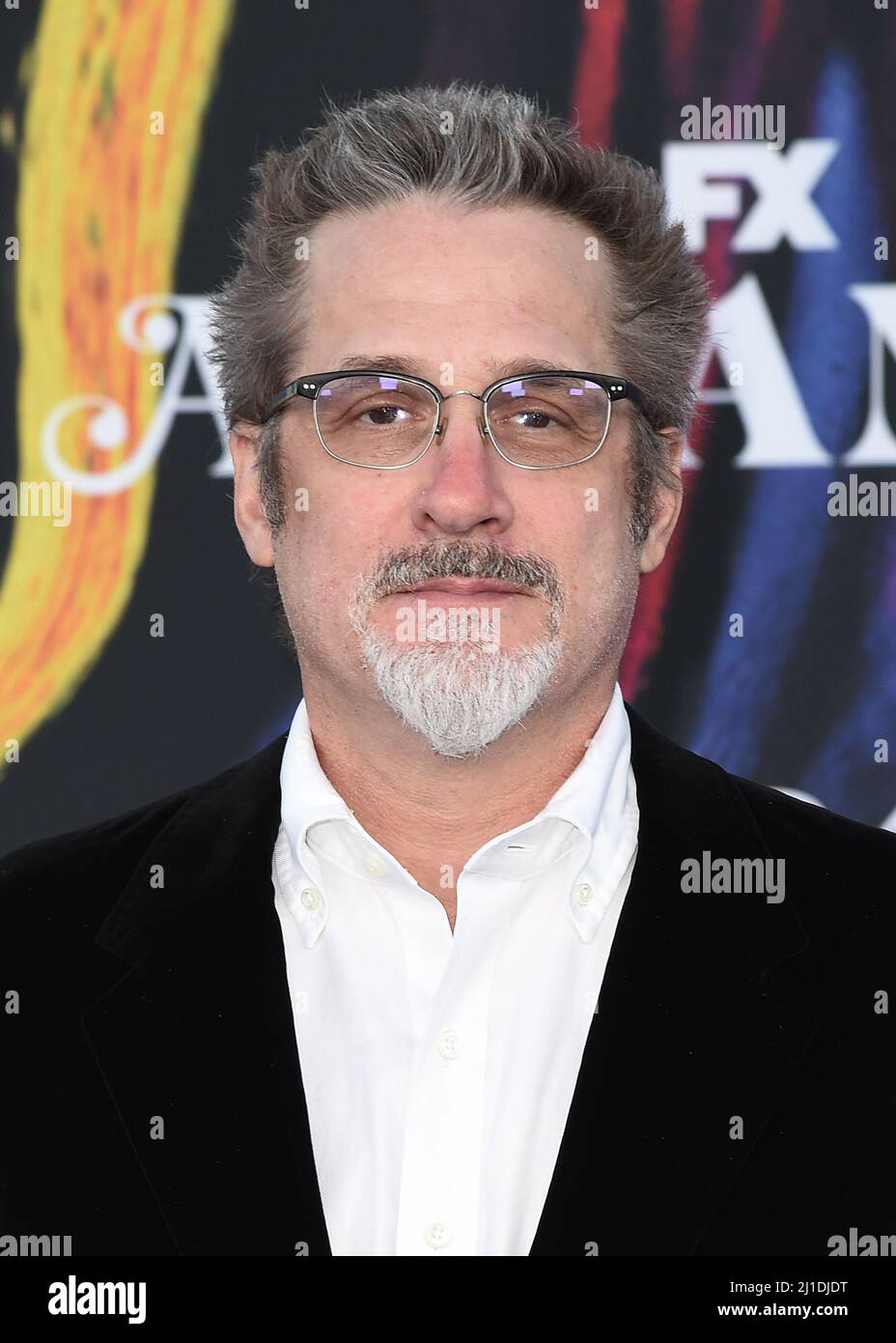 Executive Producer Paul Simms walking on the red carpet at the red ...