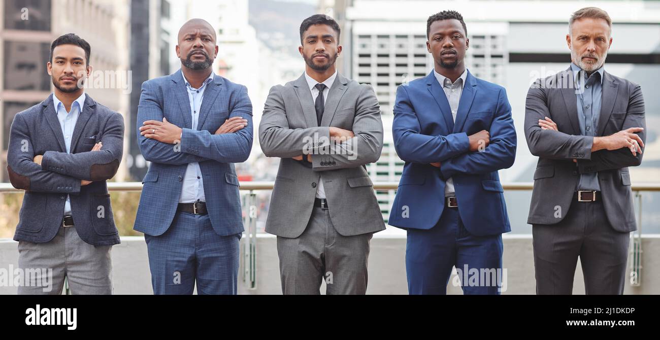 Leave it all in the rearview. Portrait of businessmen with arms folded ...