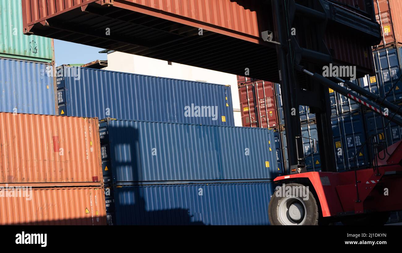 forklift working in the container cargo yard port loading cargo tank ...