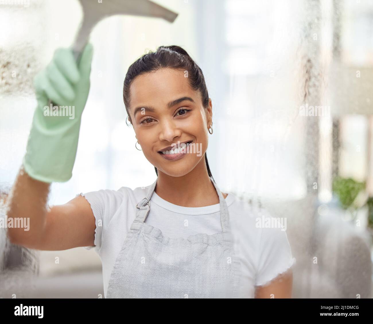 Beautiful young woman makes cleaning hi-res stock photography and ...