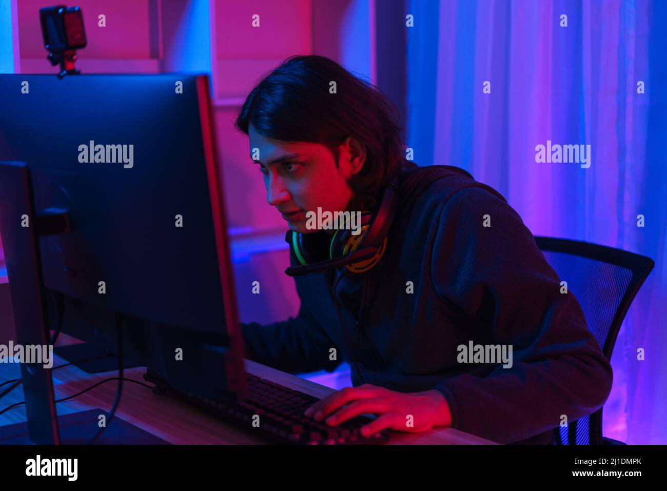 Gamer stream concept, Male streamer typing on keyboard to chat with ...