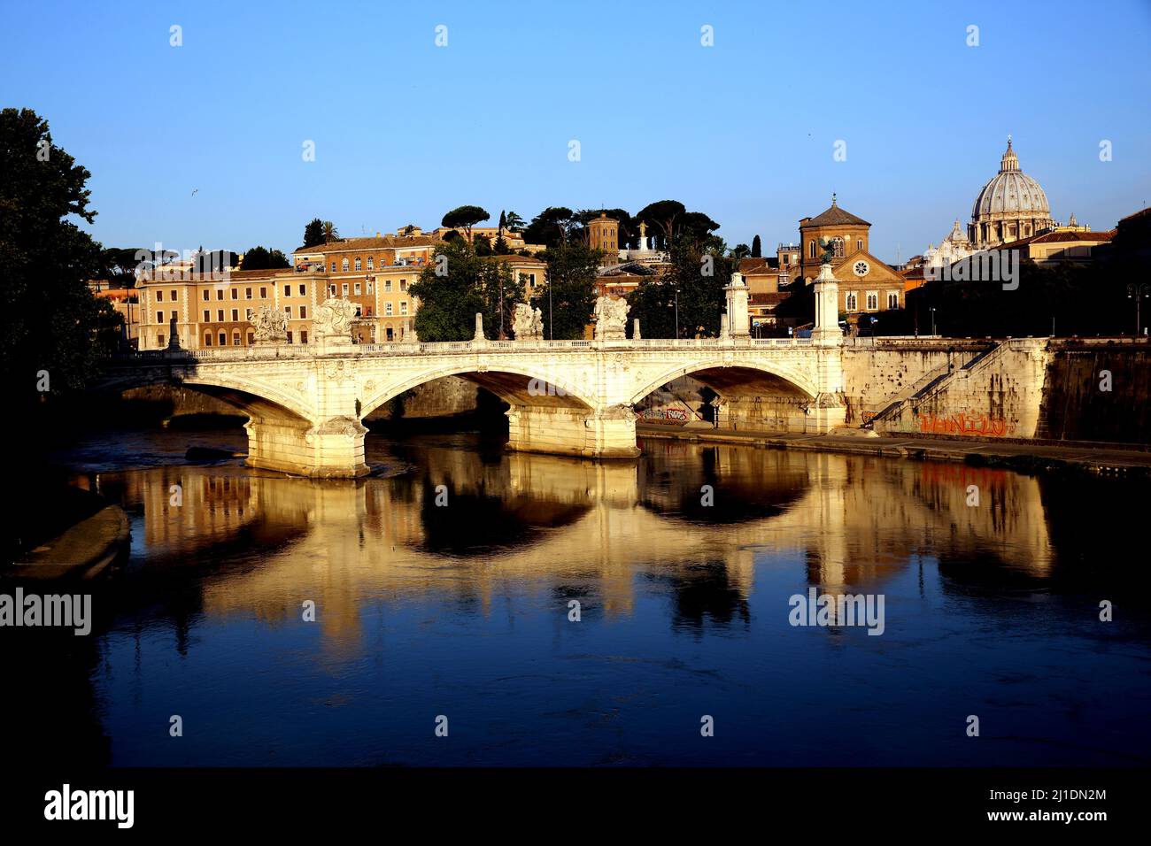 Italy. Rome. Looking across the Tiber River and Ponte Vittorio Emanuele ...