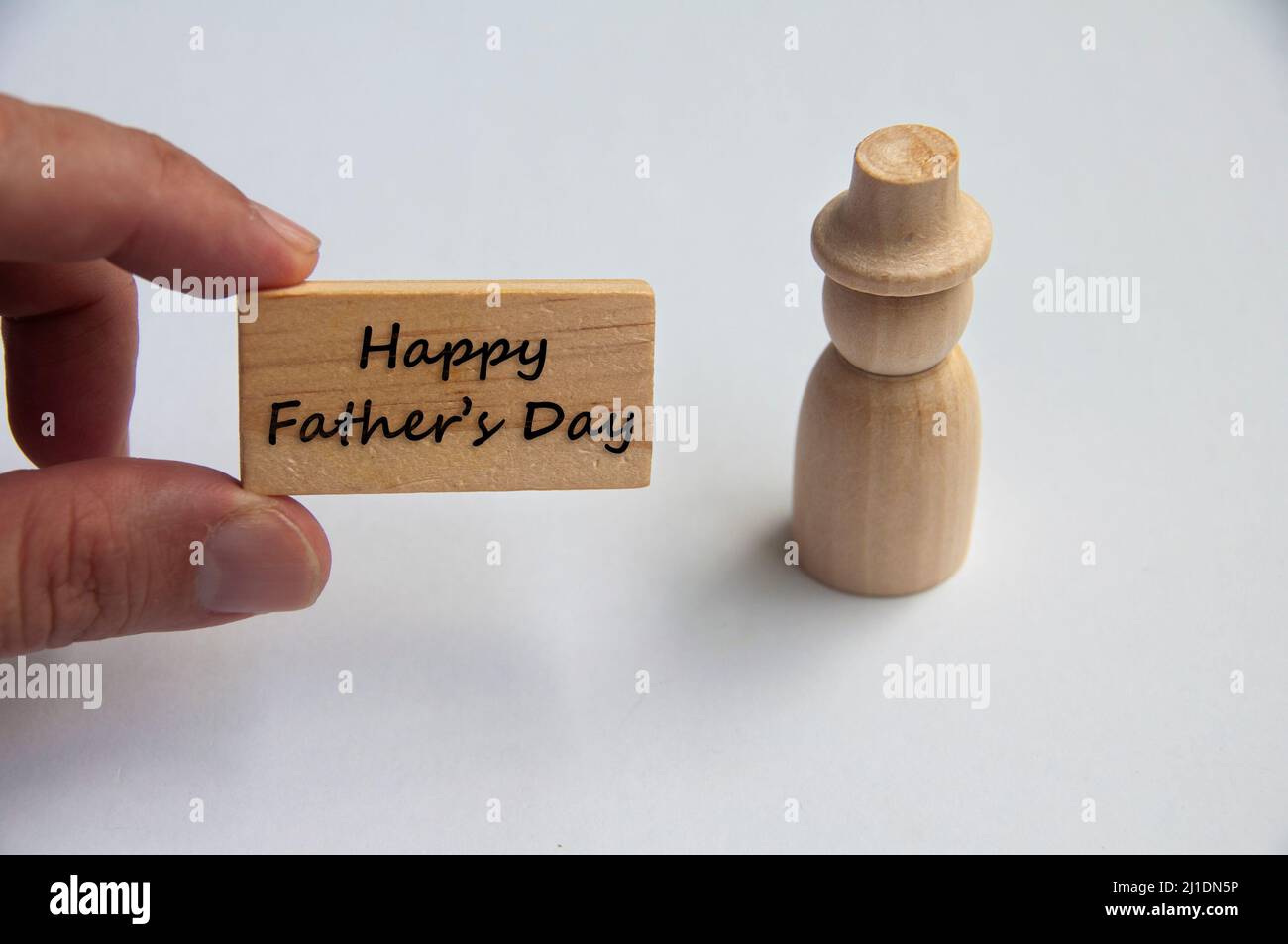 Hand holding wooden block with text - Happy father's day with wooden ...