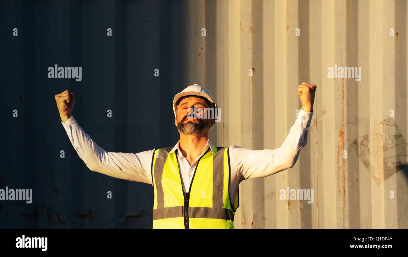 CEO or Manager in white helmet control loading Containers box in ...