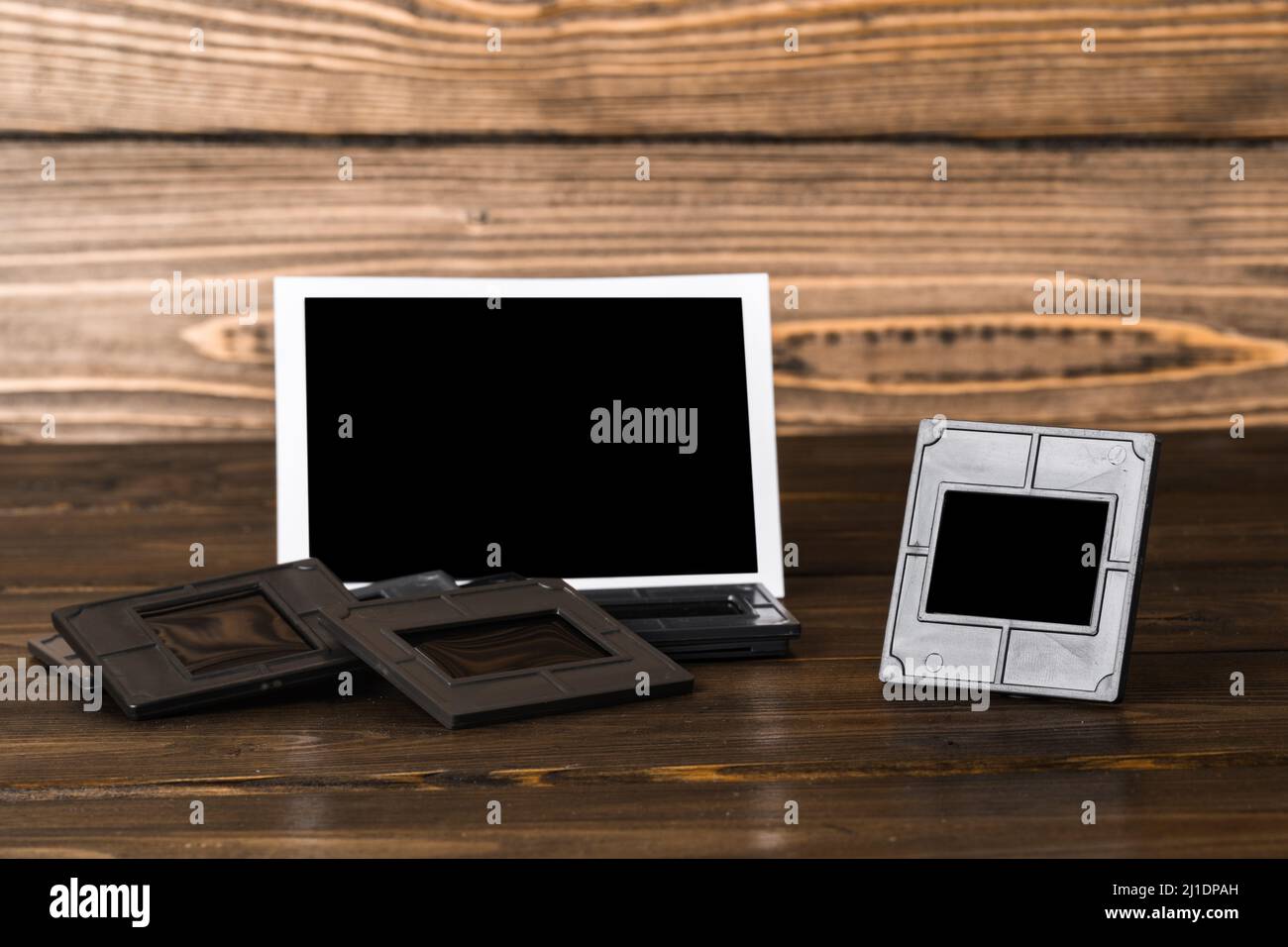 Photography empty slide frames on wooden background Stock Photo - Alamy