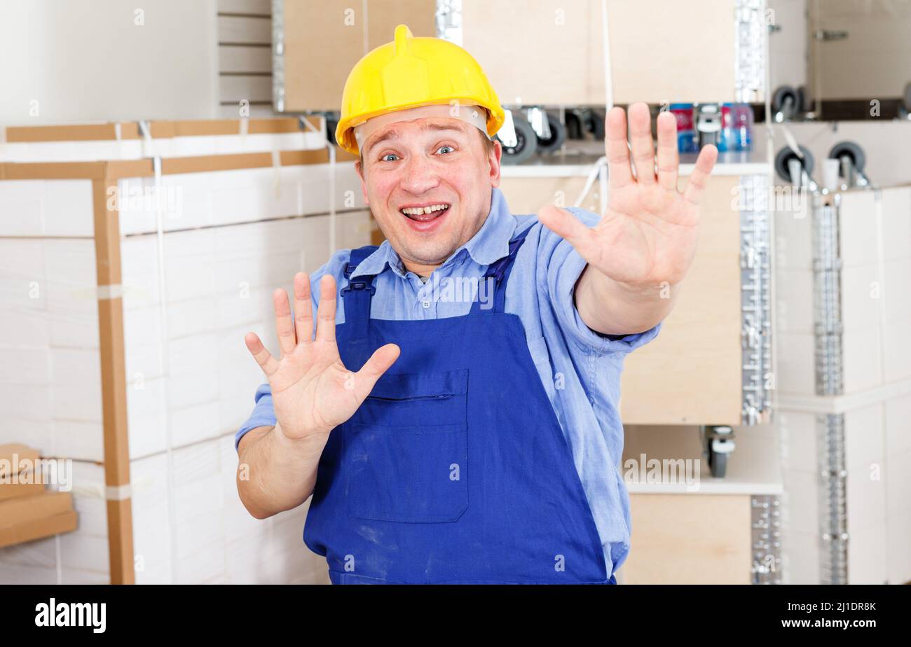 Scared builder hi-res stock photography and images - Alamy