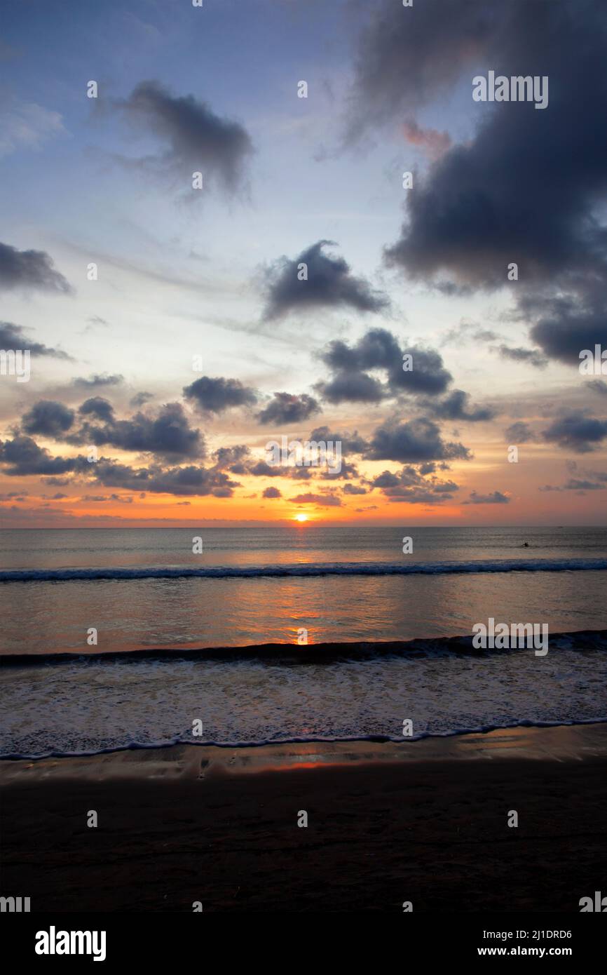 Sunset at Kuta Beach in Bali, Indonesia Stock Photo - Alamy