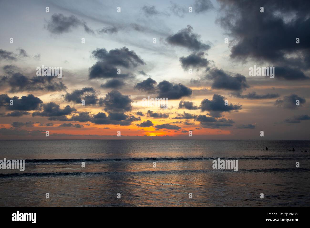 Sunset at Kuta Beach in Bali, Indonesia Stock Photo - Alamy