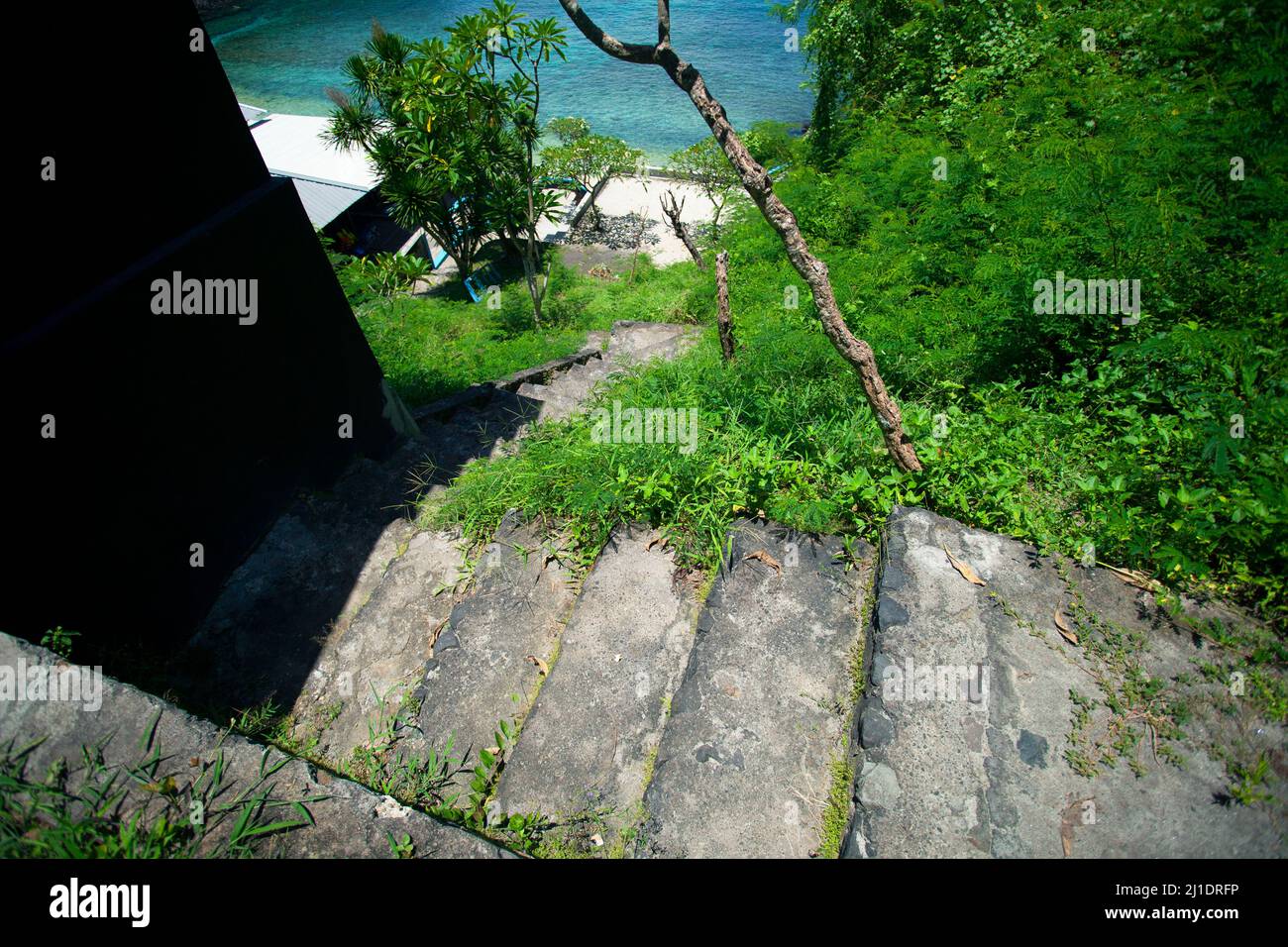 Steep steps leading to Blue Lagoon Beach in Padangbai, East coast of ...