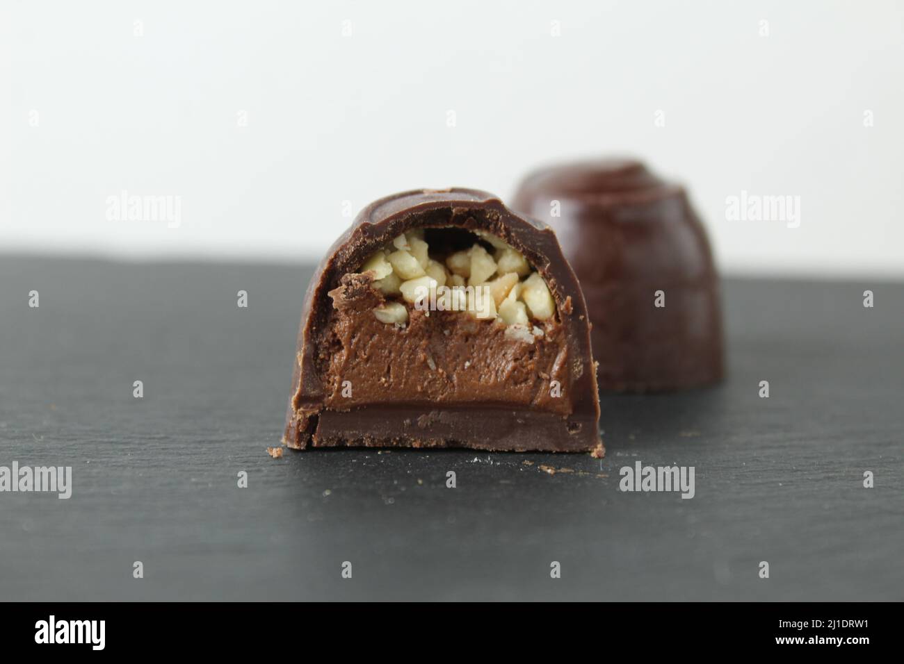 CHOCOLATE CASE CANDY WITH CHOCOLATE FILLING PRALINE GANACHE AND CRUSHED ...