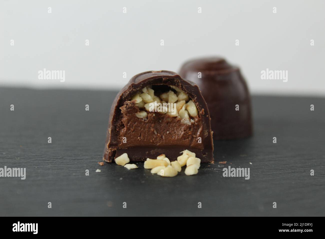 CHOCOLATE CASE CANDY WITH CHOCOLATE FILLING PRALINE GANACHE AND CRUSHED ...