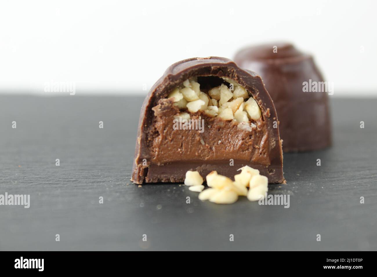 CHOCOLATE CASE CANDY WITH CHOCOLATE FILLING PRALINE GANACHE AND CRUSHED ...