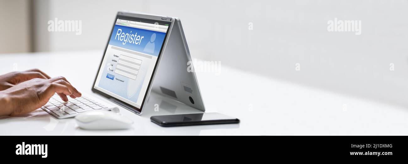Online Web Registration Form On Website Using Laptop Stock Photo - Alamy