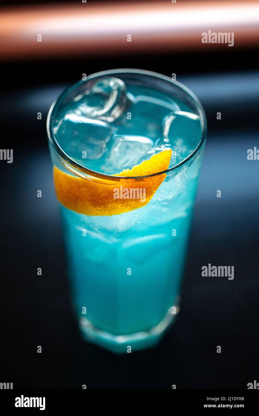Sweet cool blue cocktail with lemon and ice Stock Photo - Alamy