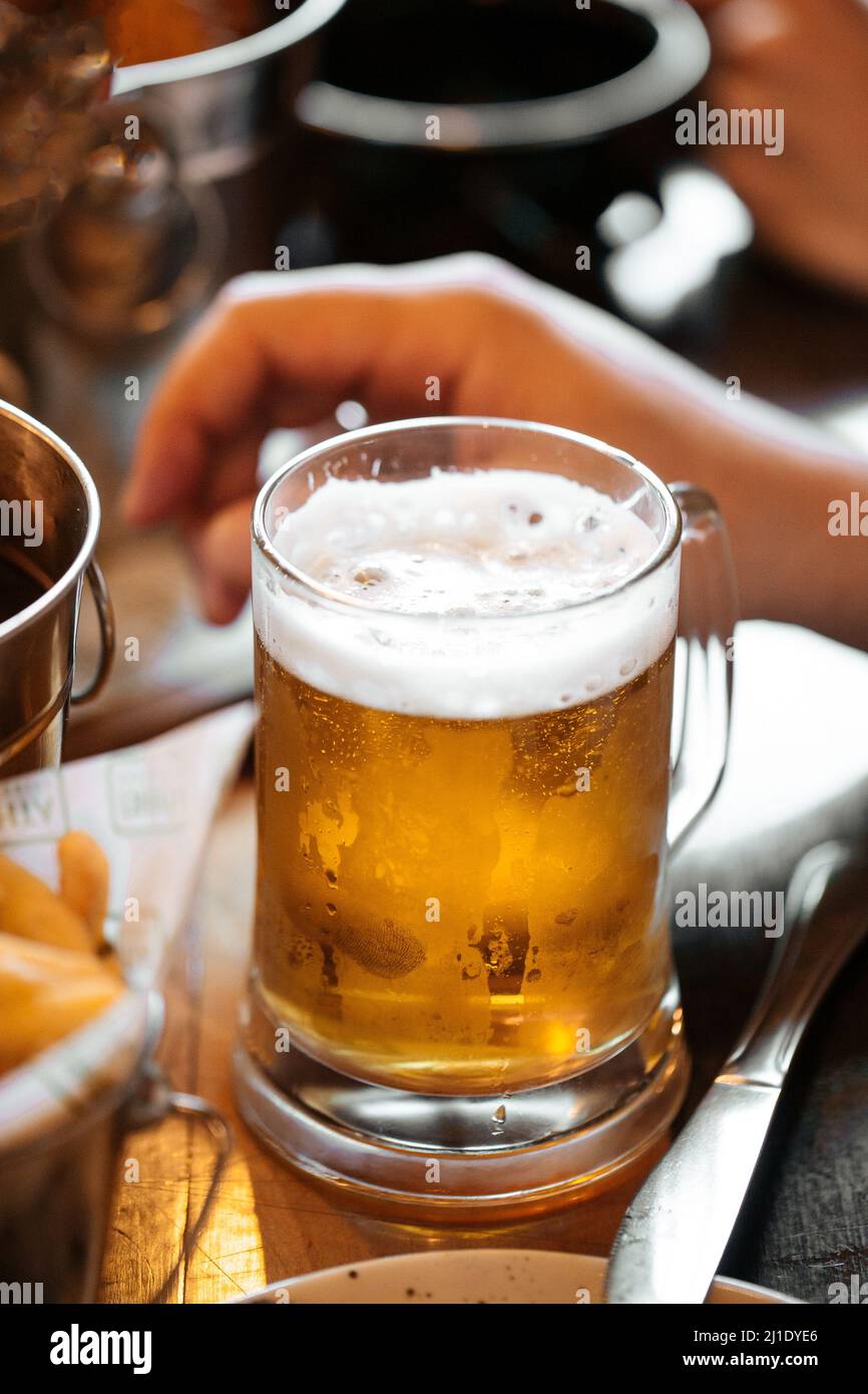 Glass mug of fresh cool beer Stock Photo - Alamy