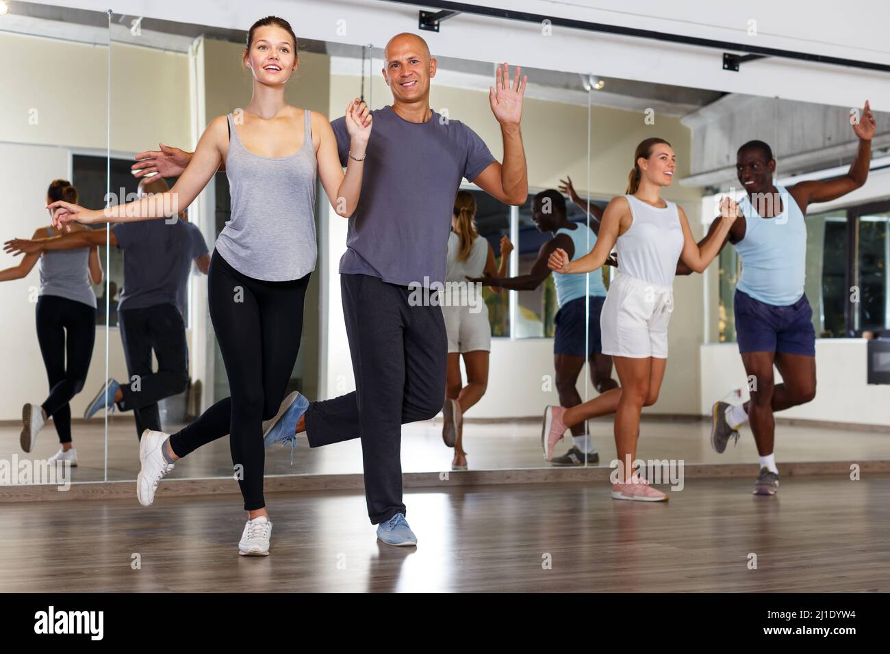 People practicing dance movements in class Stock Photo - Alamy