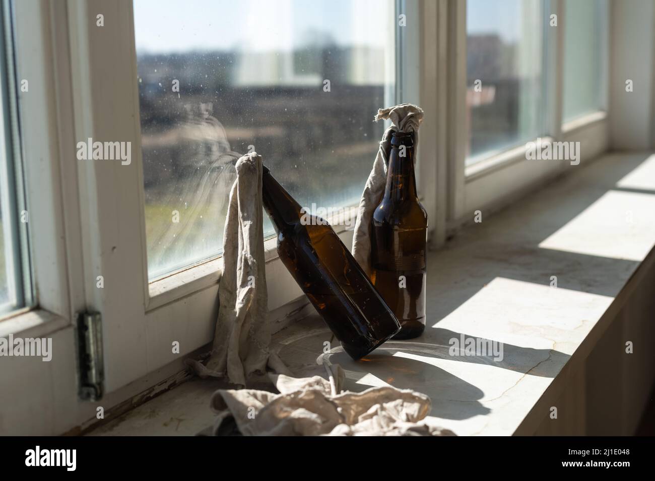 Glass bottle filled with gasoline, a so called Molotov Cocktail, on the ...