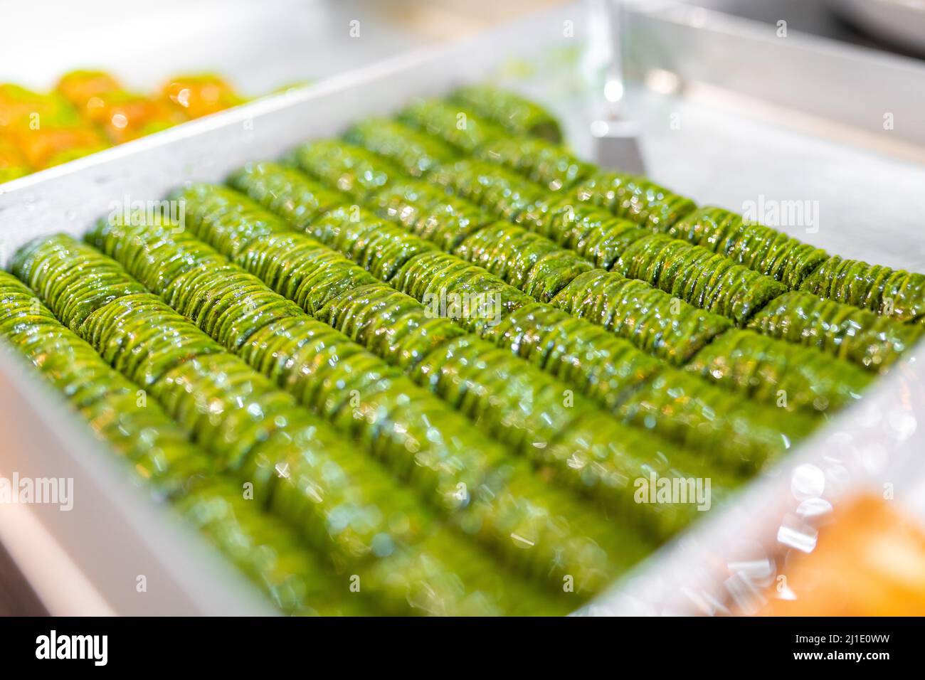 Green pistachio baklava. Close up of traditional Middle Eastern dessert ...