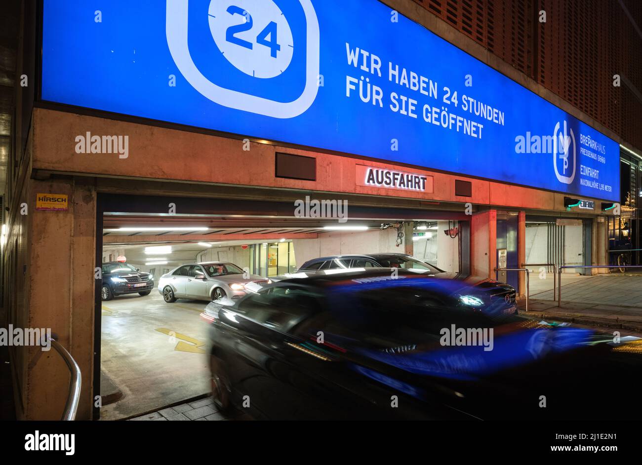 03.01.2022, Germany, Bremen, Bremen - Cars leaving the high-rise car ...