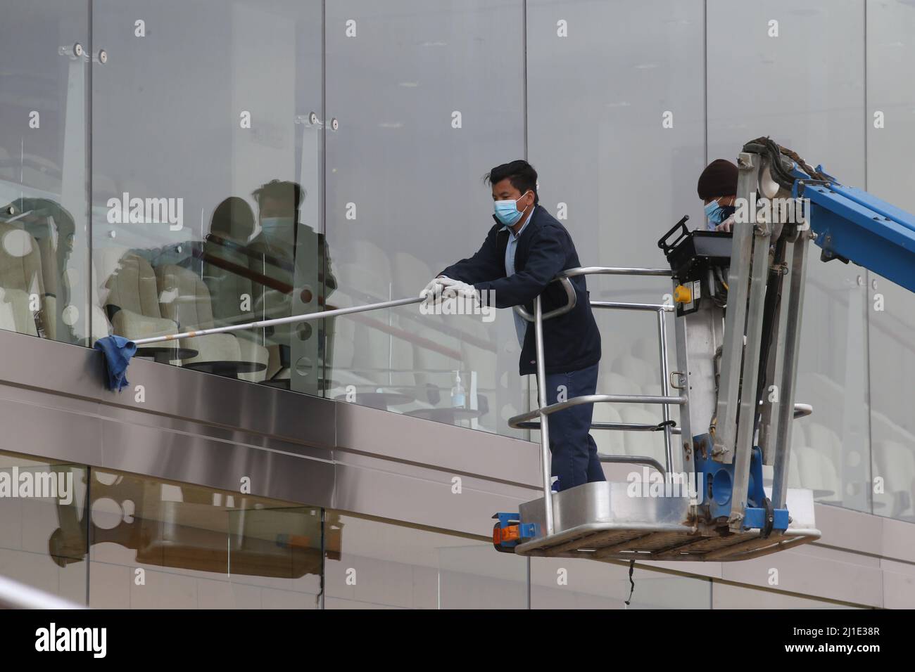 19.02.2021, Saudi Arabia, Riyadh, Riad - Building cleaners cleaning the ...