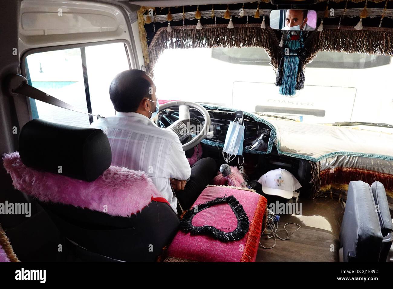 19.02.2021, Saudi Arabia, Riyadh, Riad - Bus driver at the wheel of his ...